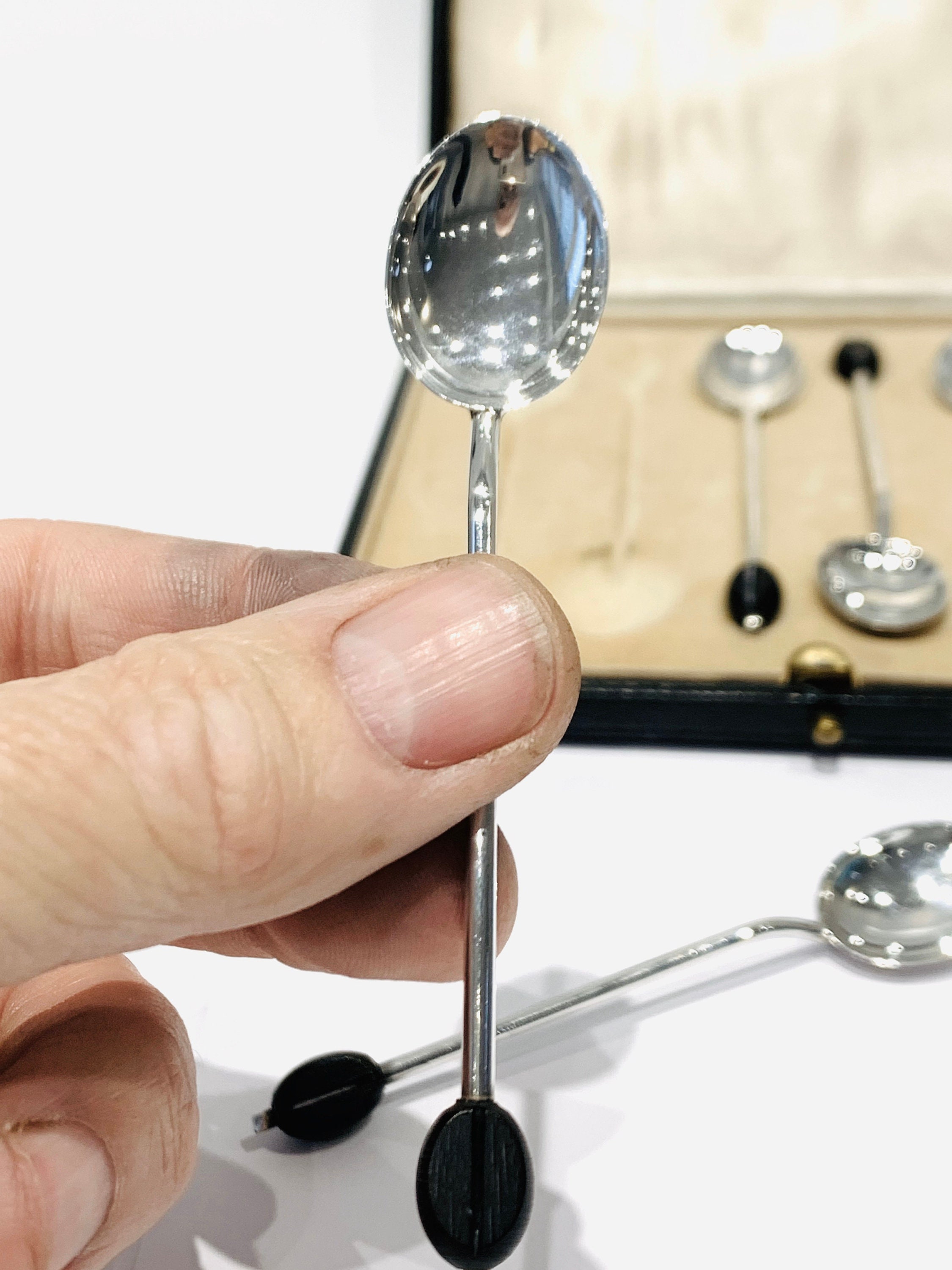 A cased set of 6 sterling silver demitasse spoons with coffee bean ...