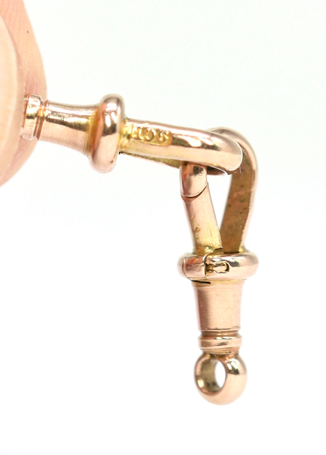 Superb matching pair of antique 9ct rose gold 19mm dog clips