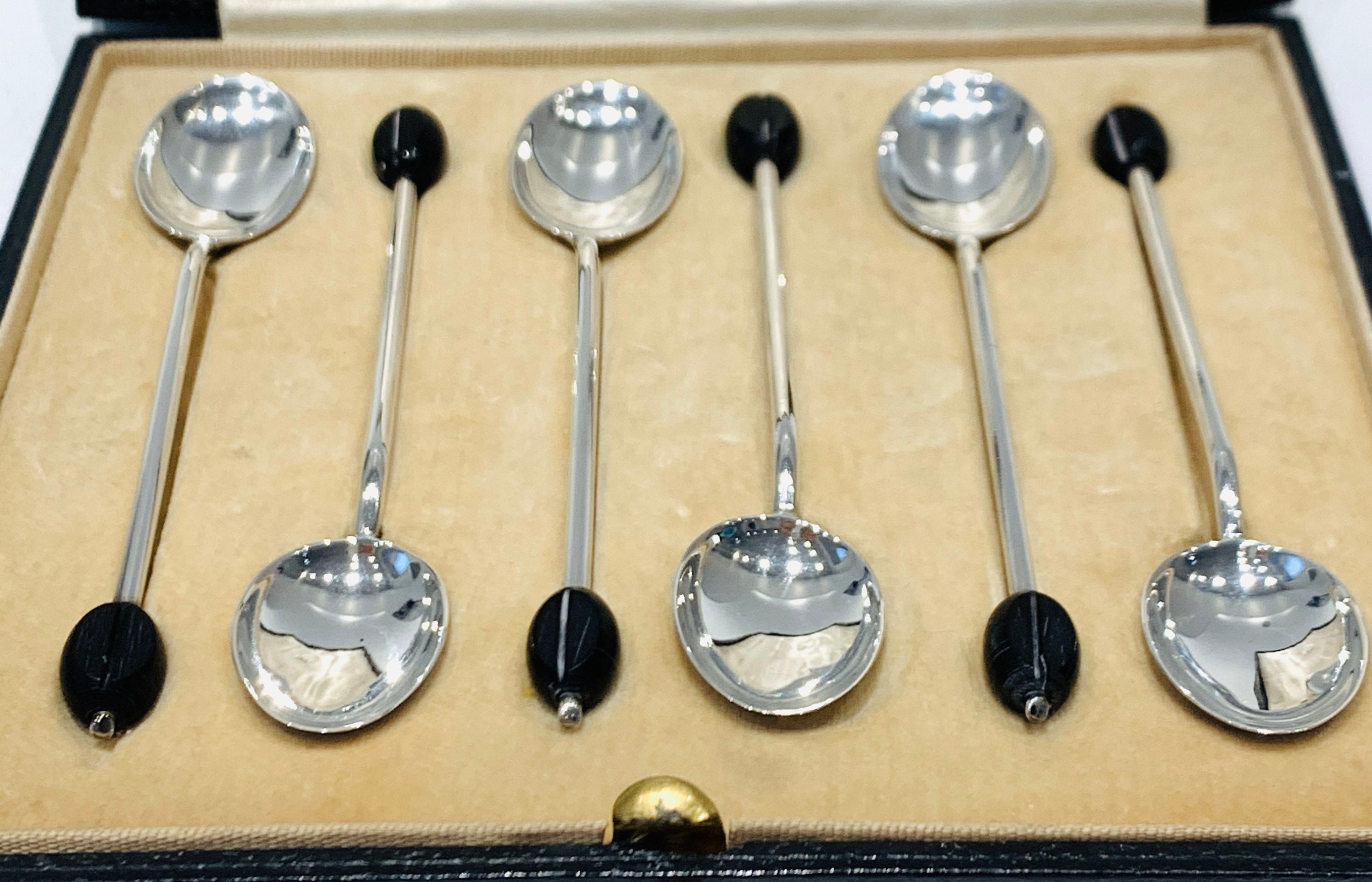 A cased set of 6 sterling silver demitasse spoons with coffee bean ...