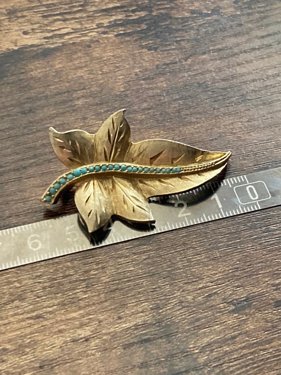Signed Sphinx vintage gold tone leaf brooch with blue… - Gem
