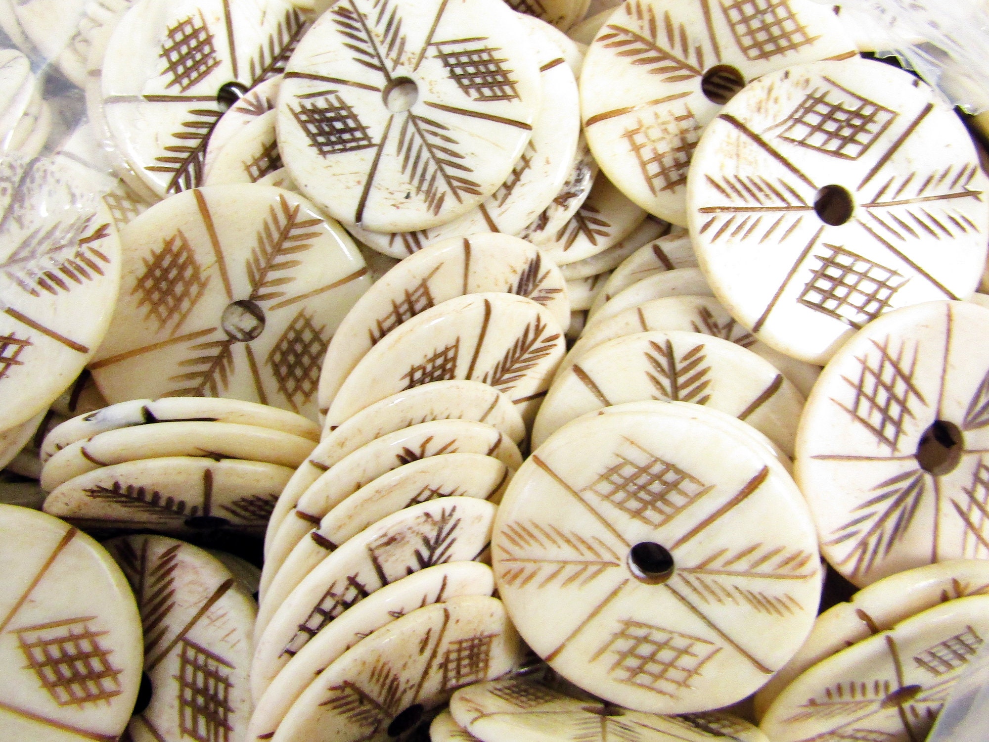 Hand Carved Bone Coins, Pack of 20 Carved Beads - Etsy.de