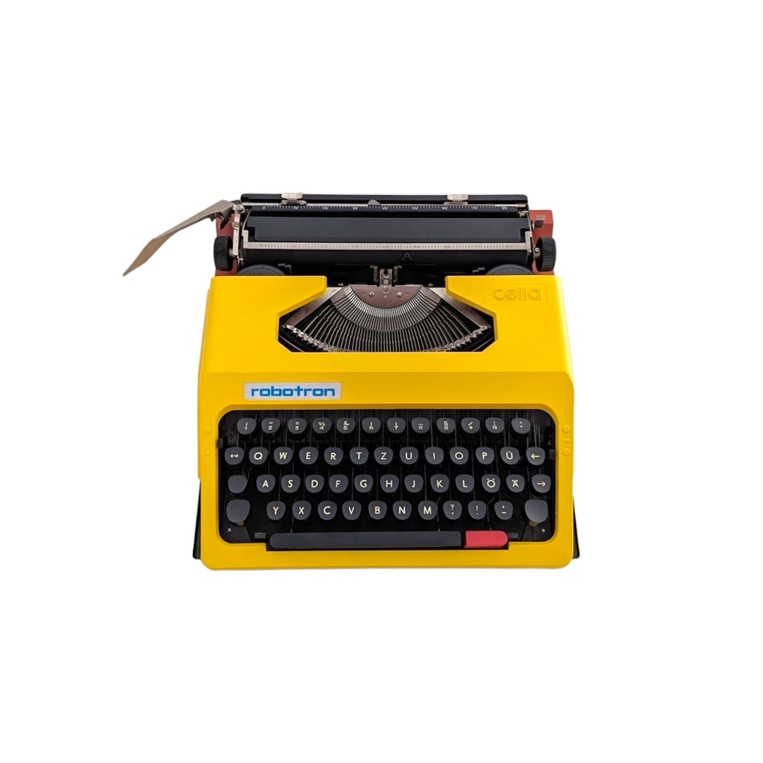 Christmas Sale Yellow Robotron Cella Typewriter, a Good Working and ...