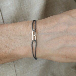 Men's Sterling Silver String Bracelet With Interlocking Charm ...