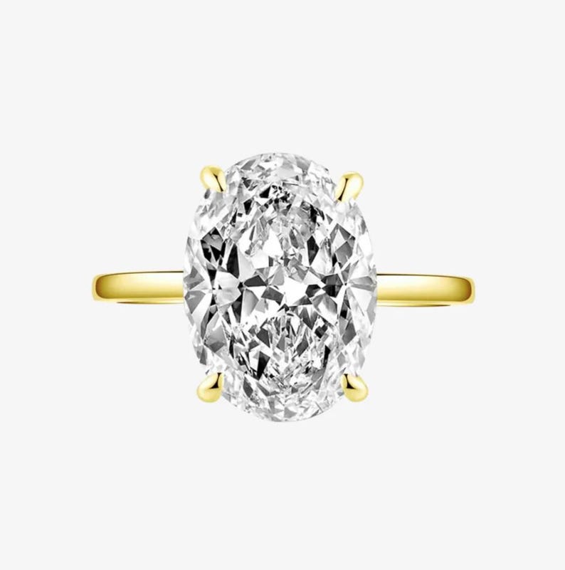 Hailey Bieber Engagement Ring, Oval Cut, Yellow Gold, 5 Carats ...