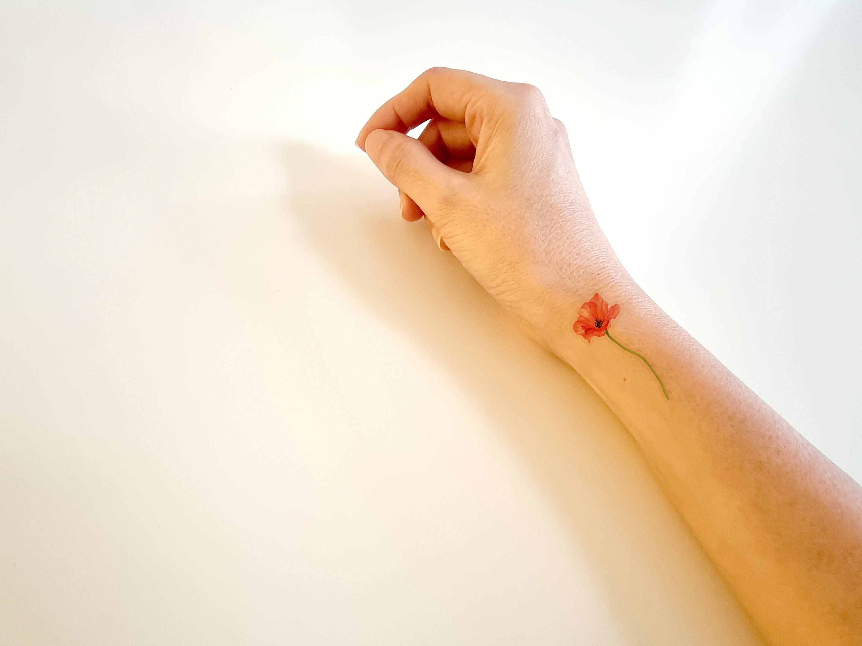 Red Poppy Wrist Tattoo
