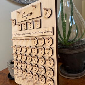 Wood School Calendar With Year, Seasons, and Weather - Curriculum ...