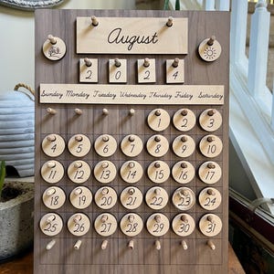 Wood School Calendar With Year, Seasons, and Weather - Curriculum ...