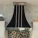 Custom Black Range Hood With High-polished Stainless Steel Details ...