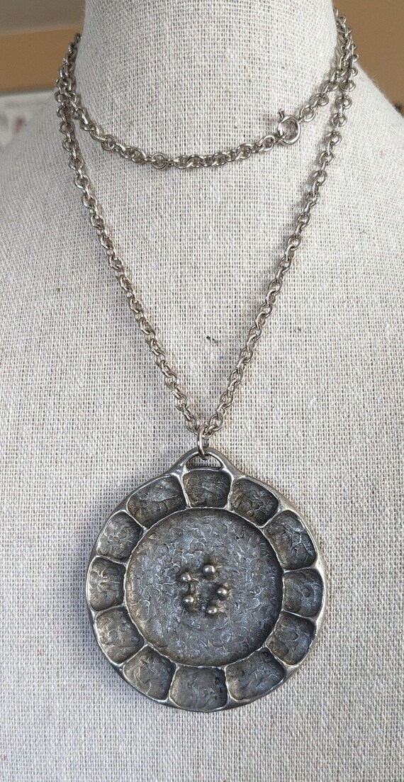 large medallion and - Gem