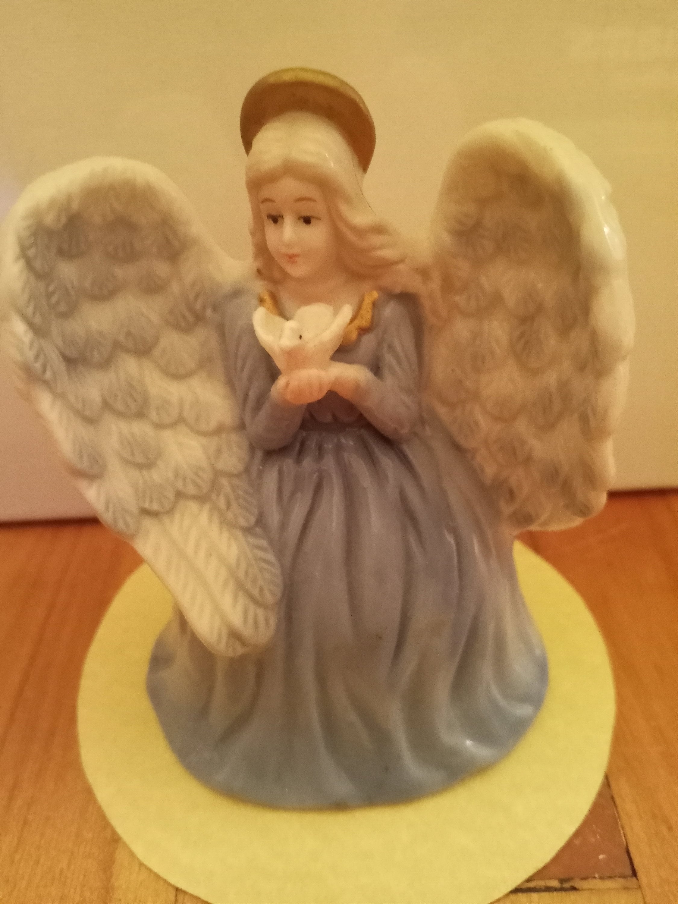Angel Holding Dove Figurine - Etsy