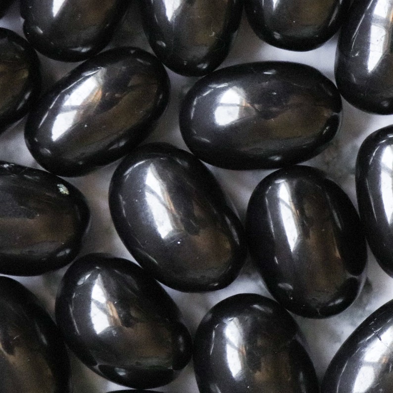 Jet Crystal - Tumbled Stone - Polished Stone - Gemstone / Against ...