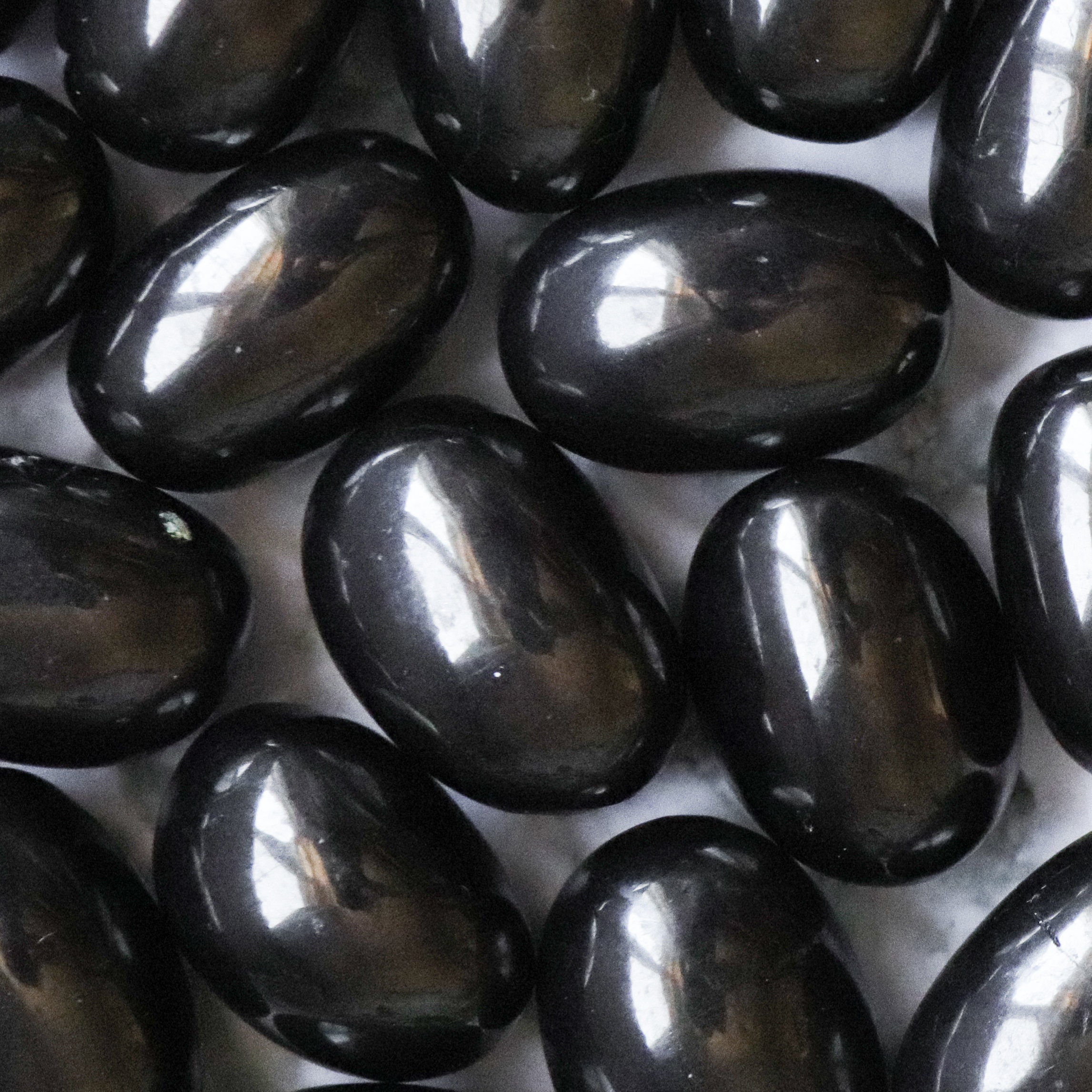 Jet Crystal - Tumbled Stone - Polished Stone - Gemstone / Against ...