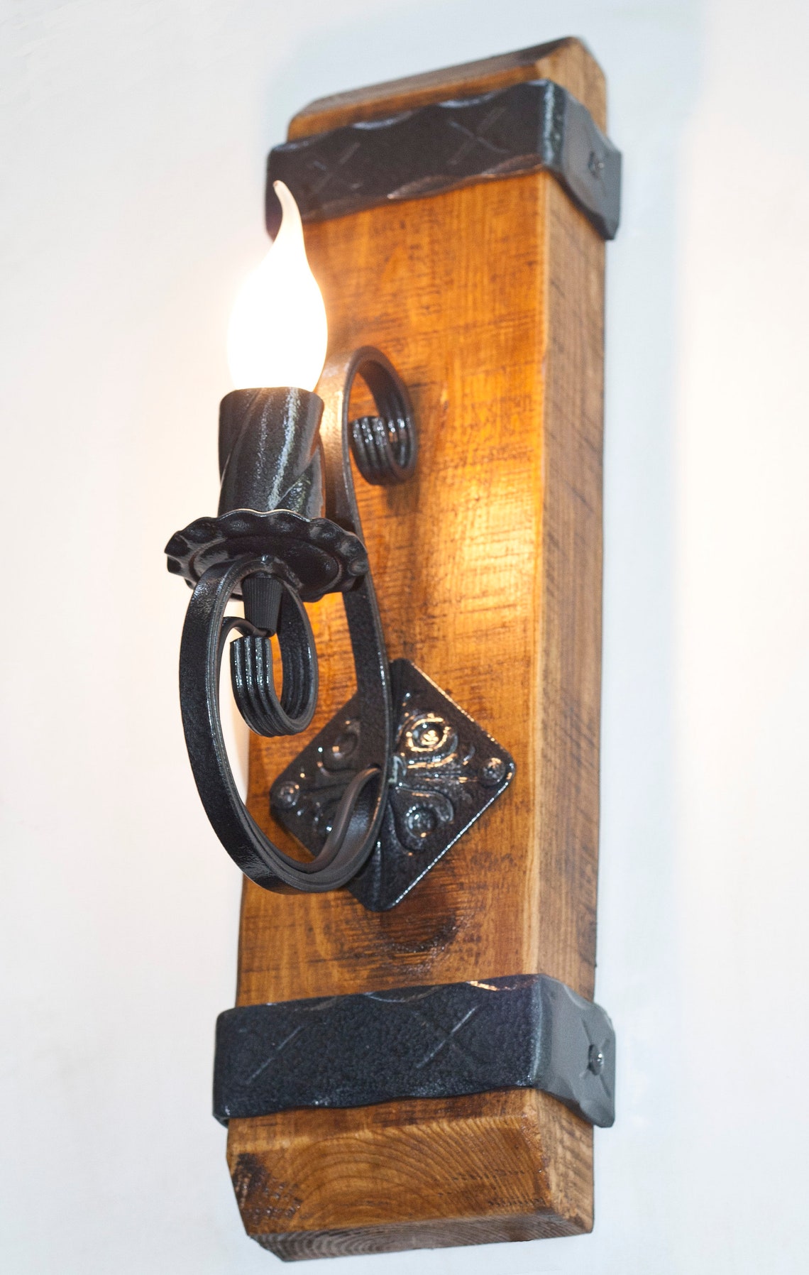 Rustic wall light. Wood and wrought iron sconce. | Etsy