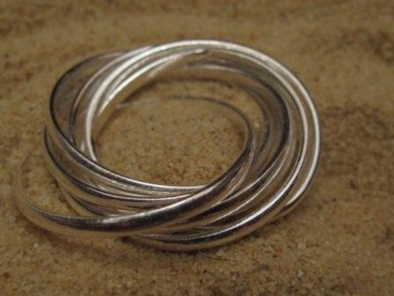 7 Interlocking Silver Bands Ring. Seven Rings Together Ring. - Etsy