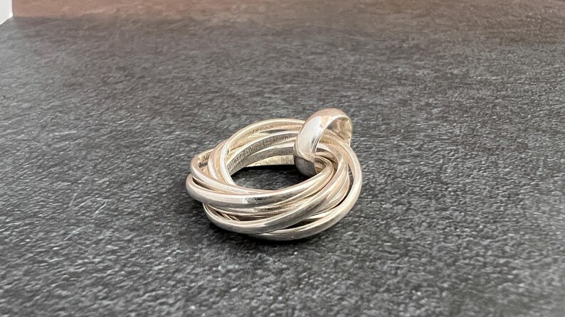 Sterling Silver 7 Interlocking Rings Pendant - Etsy