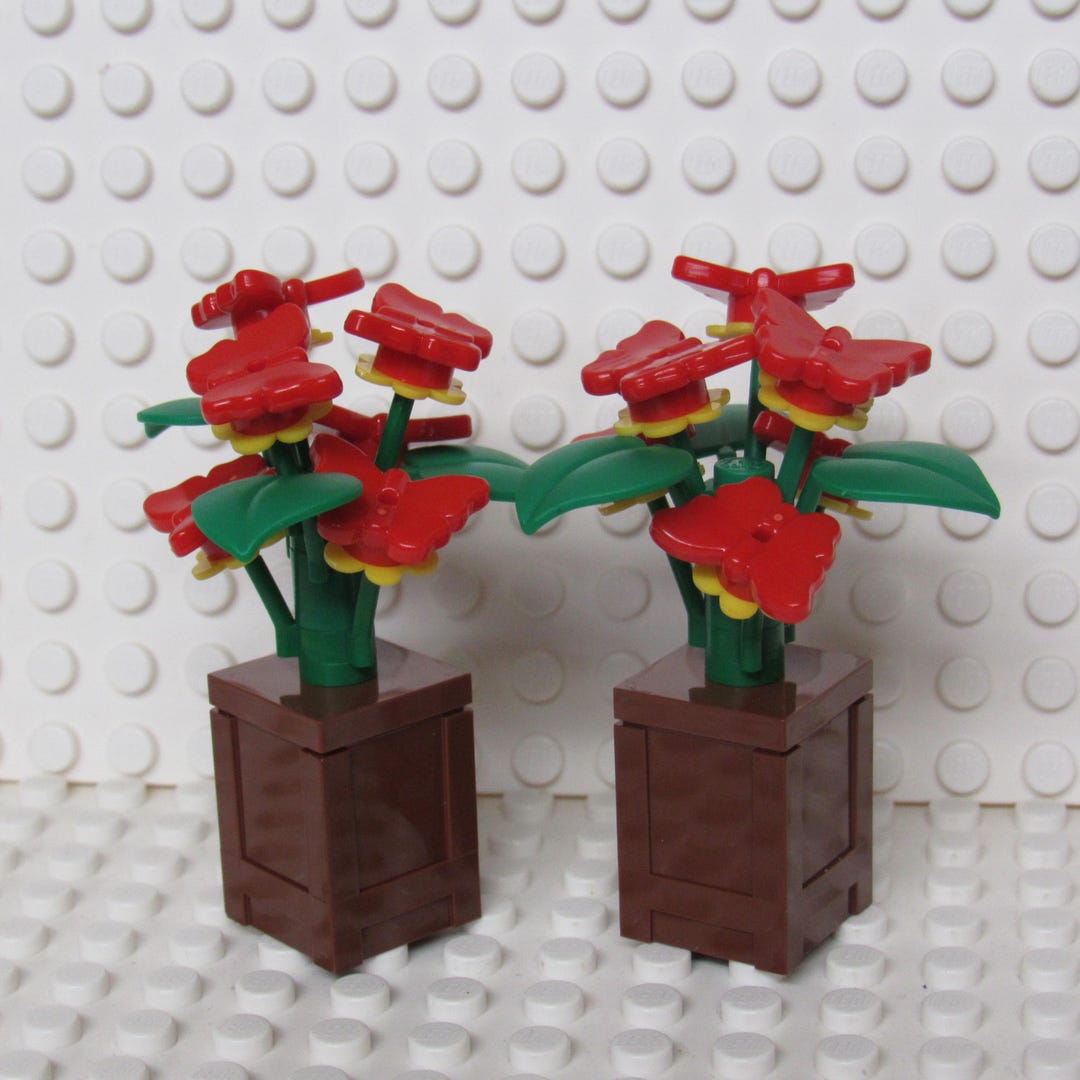 Red Butterfly Bushes With Large Leaves and Yellow Flowers Made From ...