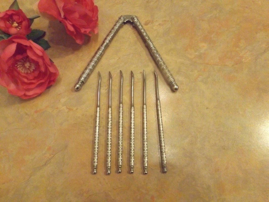 Vintage Metal Nutcracker With Lot of 6 Pick Embossed With a Cross Hatch ...