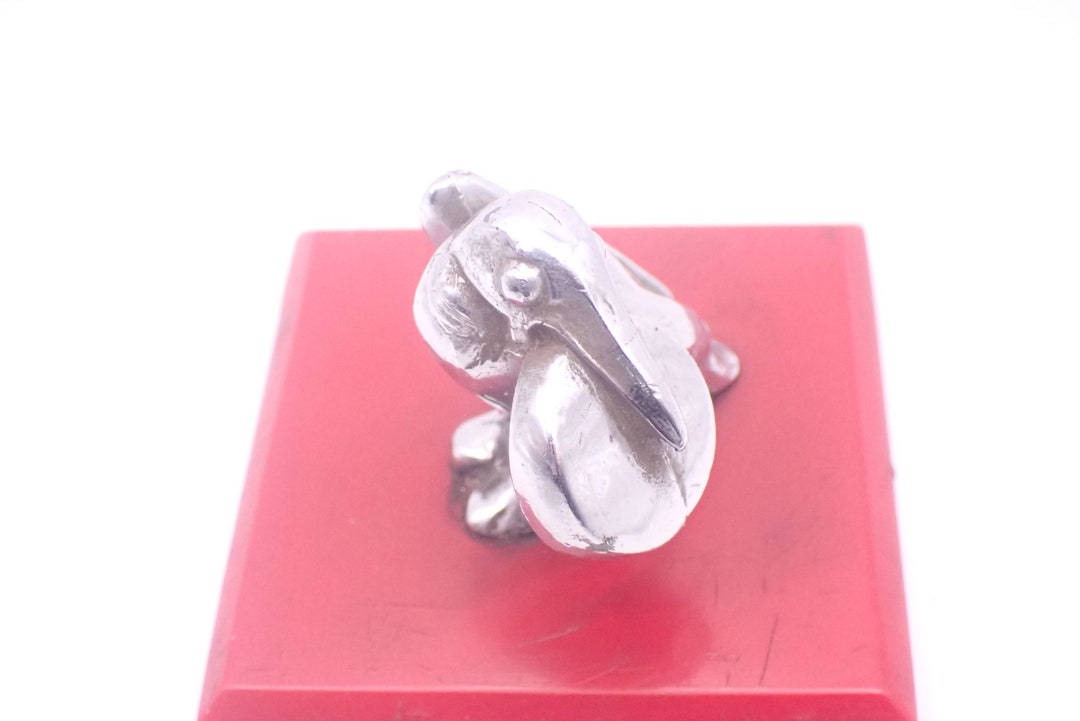 Art Deco Chrome Bird Magpie Crow Figure on Red Plastic Bakelite Type ...