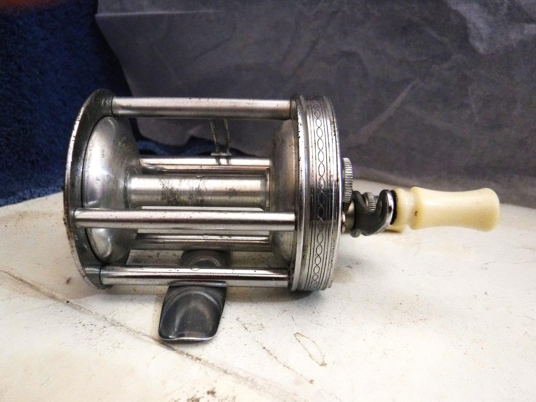 Vintage Pflueger 1940's -50's " Summit 1993l...white Handles ...
