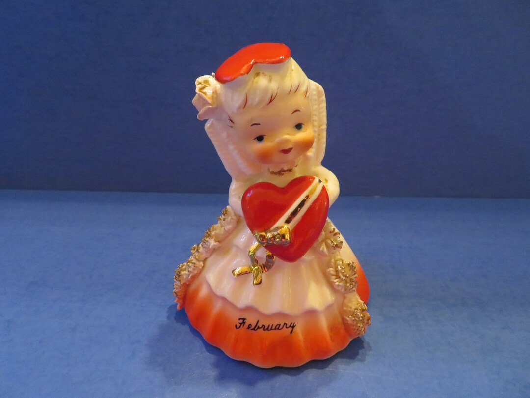 Napco February Angel Bell Wearing Heart Shaped Hat, Holding a Heart ...