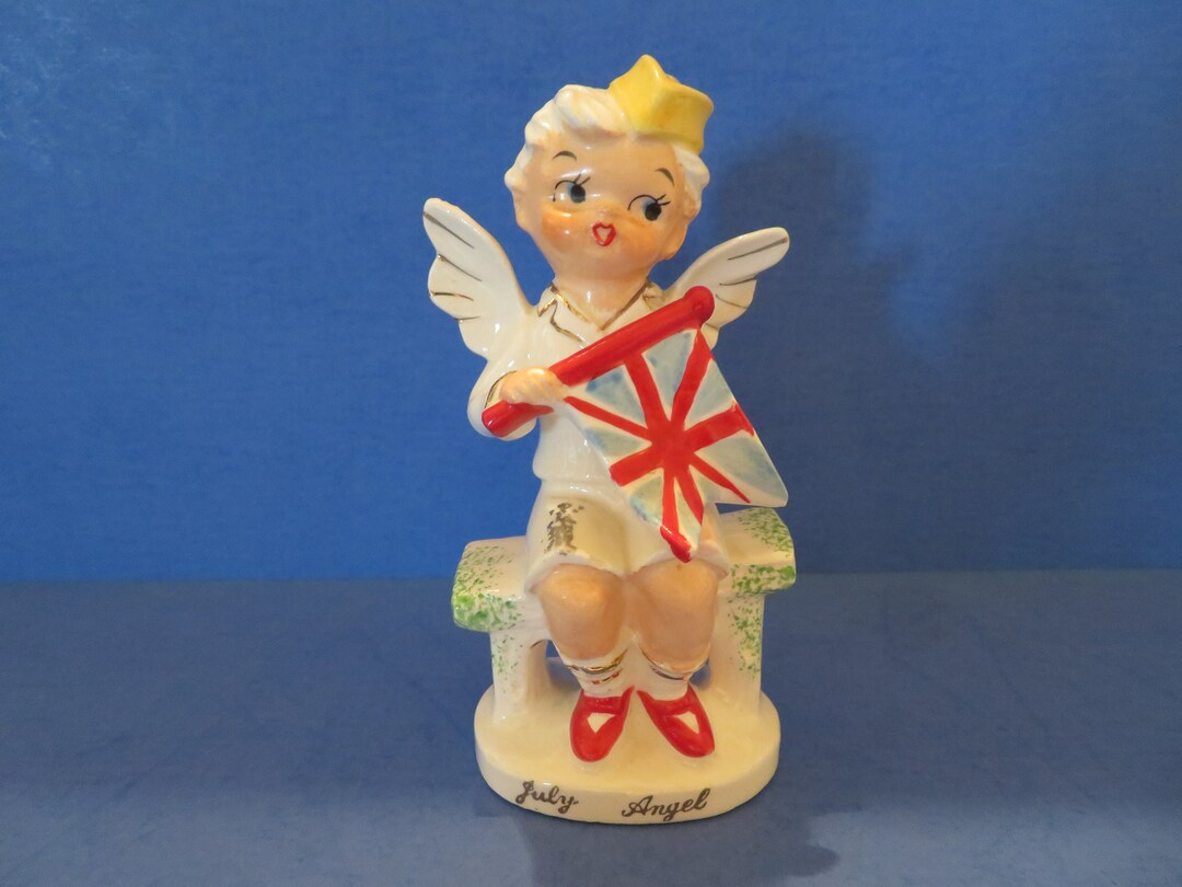 Artmark July Boy Angel Holds Union Jack - Red, White and Blue Flag ...