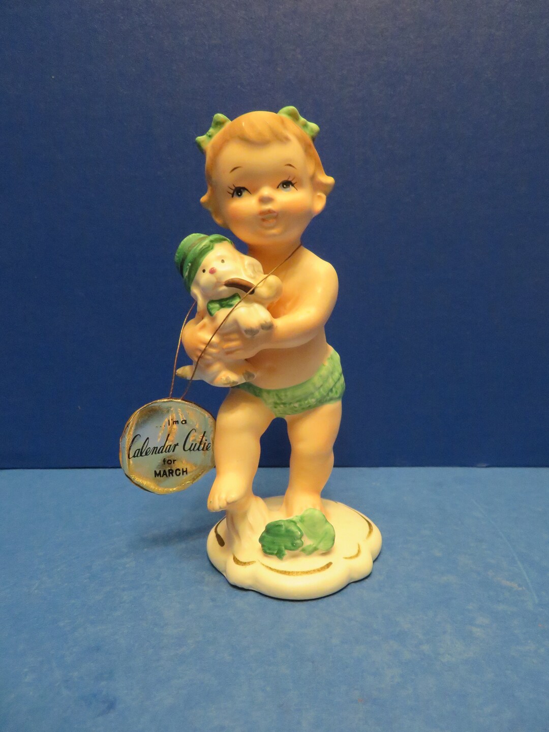 Napco March Calendar Cutie - Adorable Little Girl Holding a Puppy ...