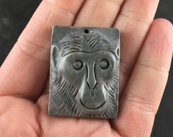 Monkey necklace in brushed sterling silver