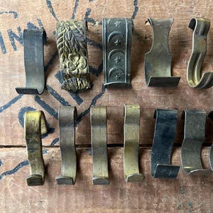 Antique Set of 17 Picture Rail Hooks - Etsy