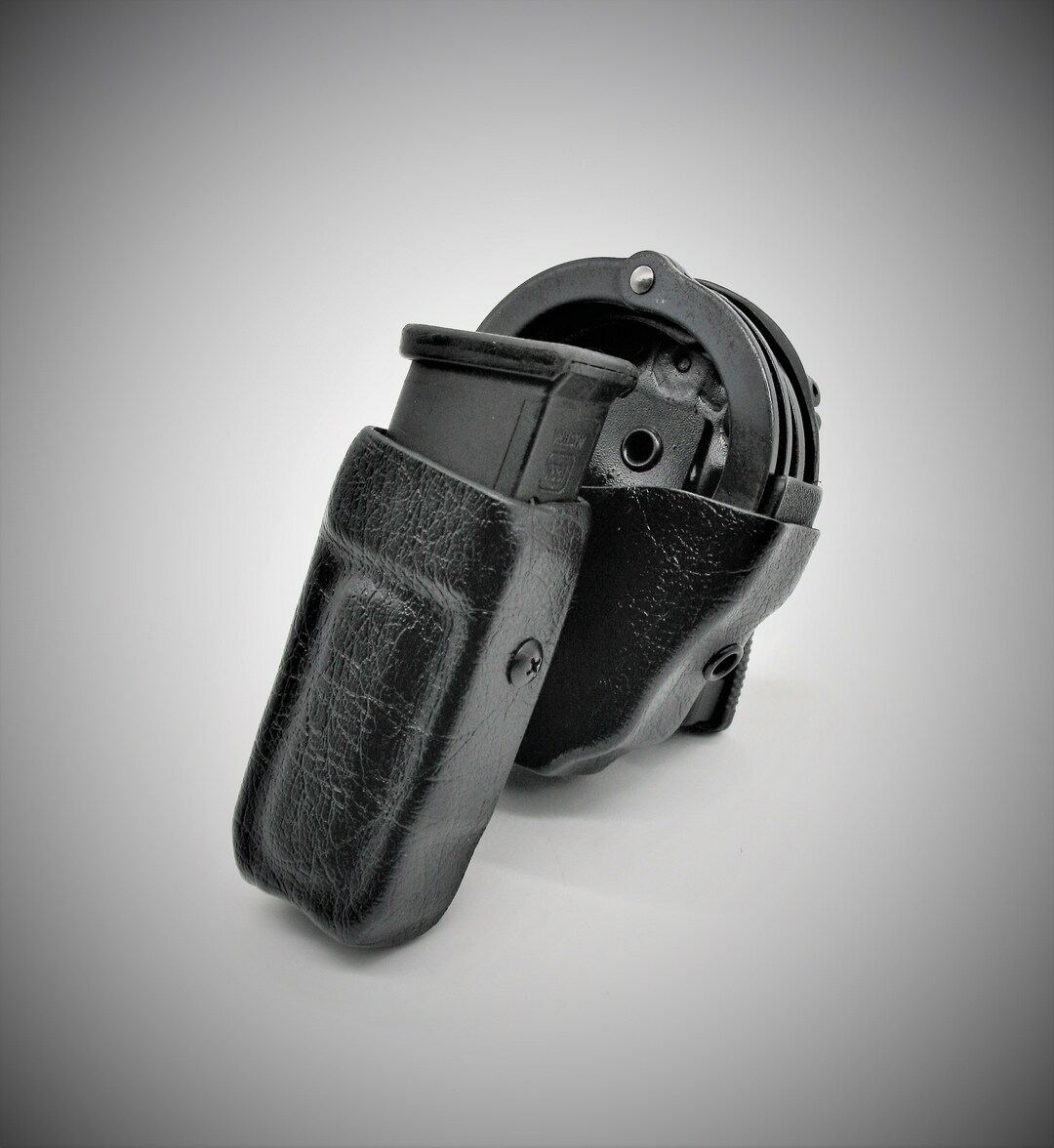 Handcuff, Magazine Combo, Sleek and Trim-suit Gear for Plain Clothes ...