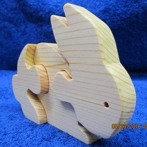 Wooden Bunny Puzzle Toy for Children. Wooden Handmade Animals. A ...