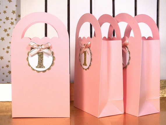 Pink and gold goodie bags store