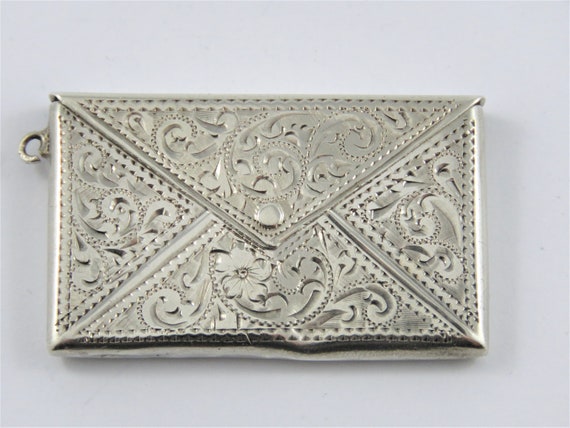 Silver stamp holder | Antiques Board