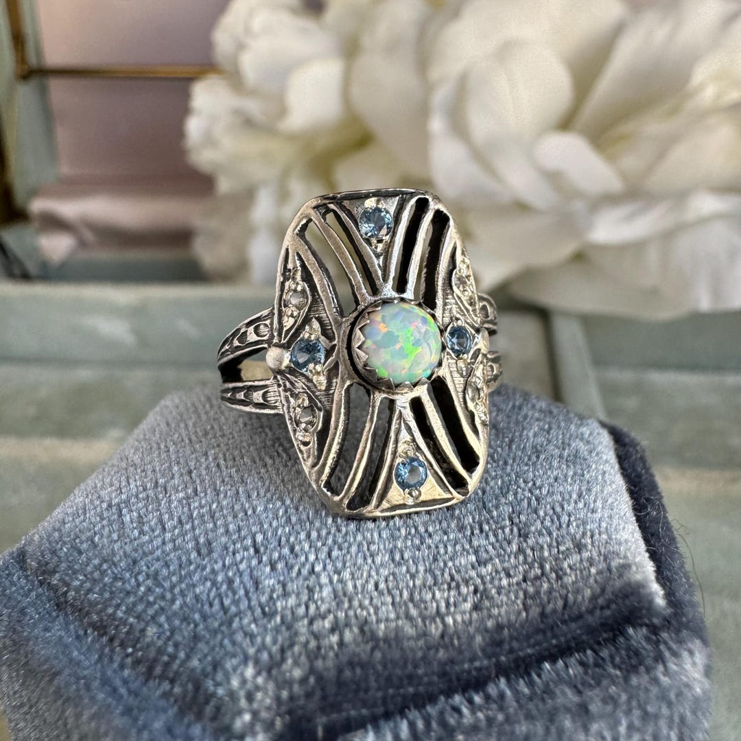 Art Deco Kyocera Opal, Blue Zircon, and White Sapphire Artisan Cigar ...