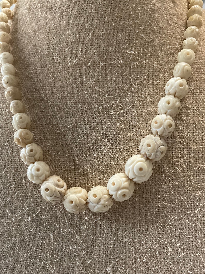 Carved Bone Necklace - Etsy