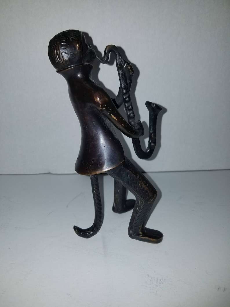 Charming Monkey Blowing Horn Metal Figurine - Etsy