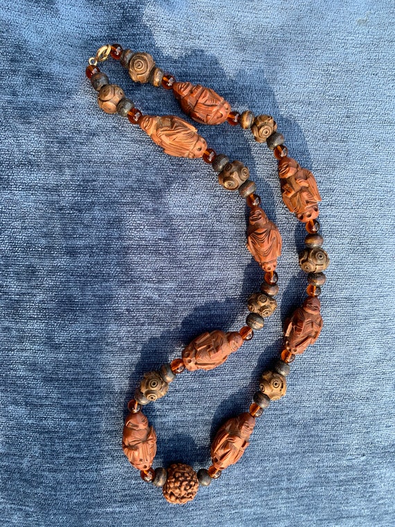 vintage buddhist carved nut - Gem