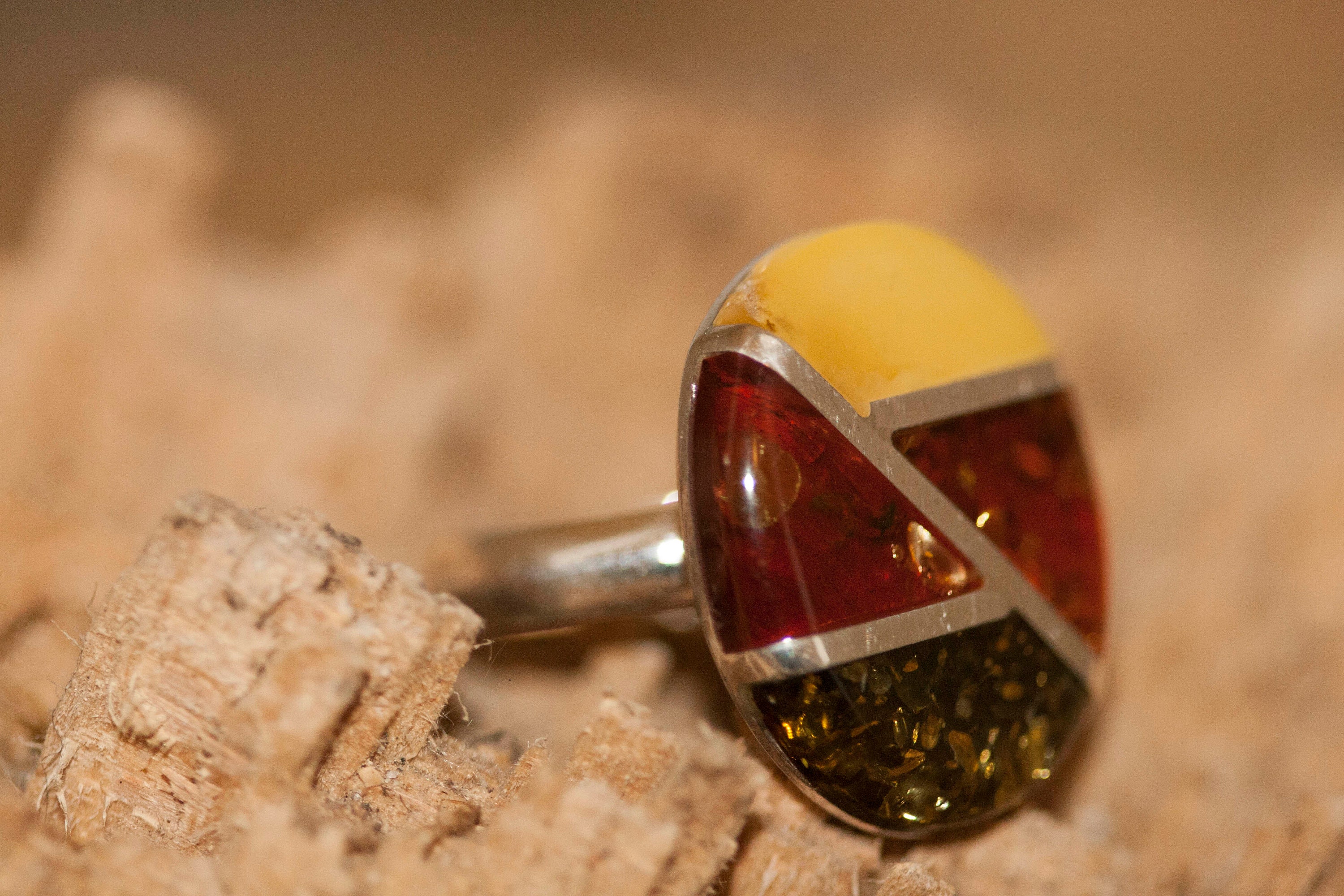 Large Baltic amber ring. Three kinds of amber shades fitted in sterling ...