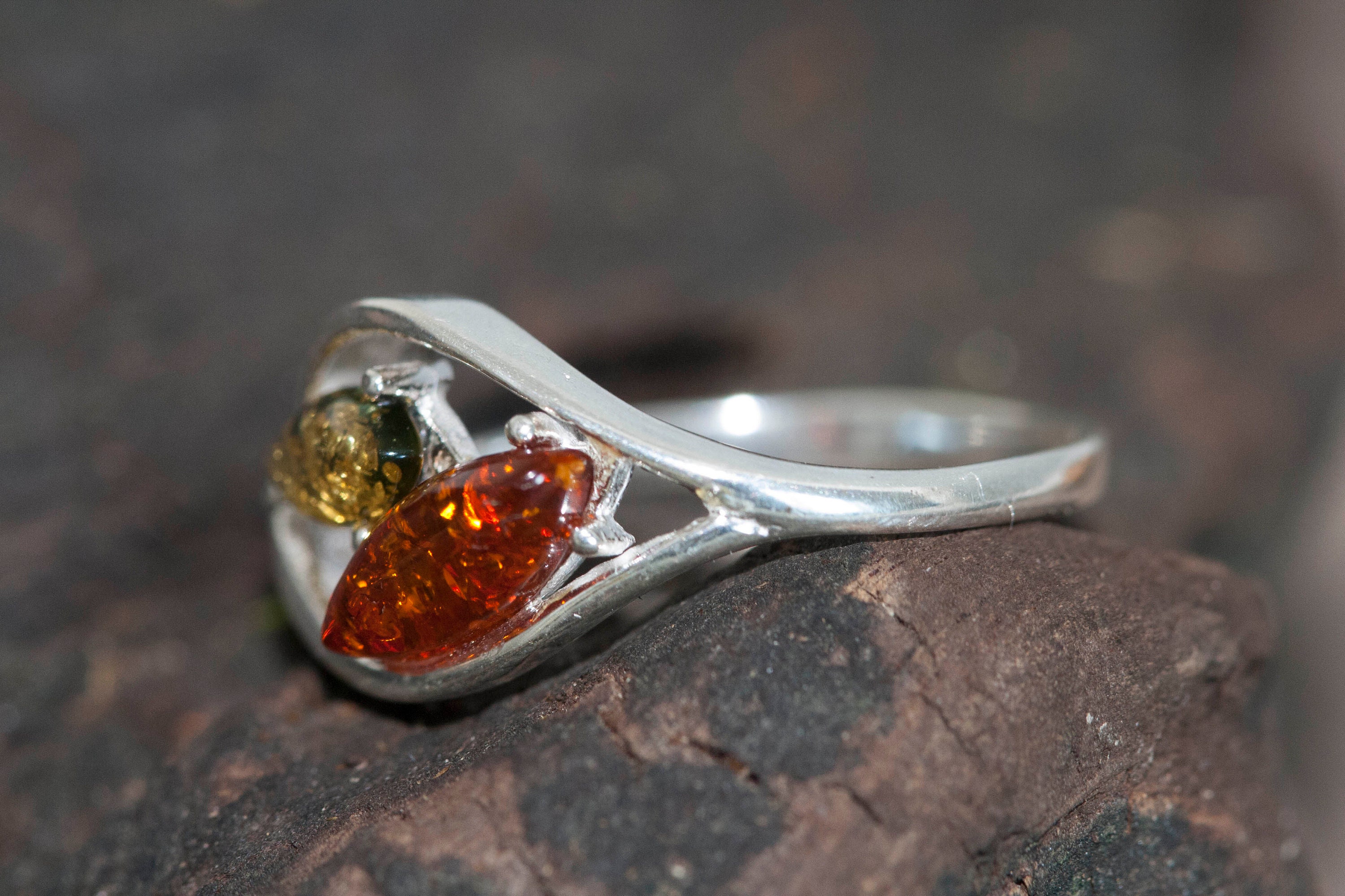 Cognac and green amber ring. Baltic amber ring. Two different shades of ...