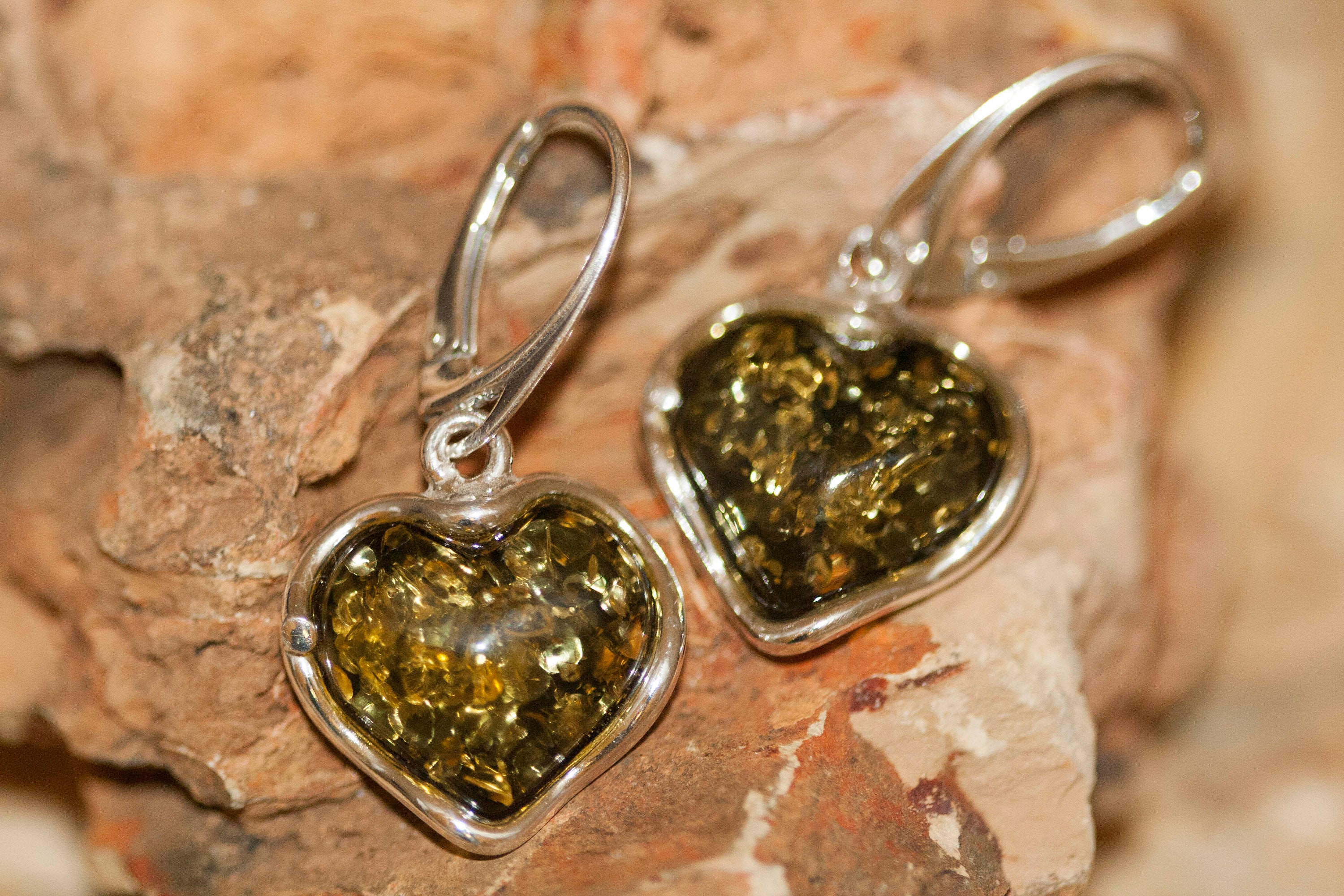 Heart shaped amber earrings fitted in a Sterling Silver setting ...