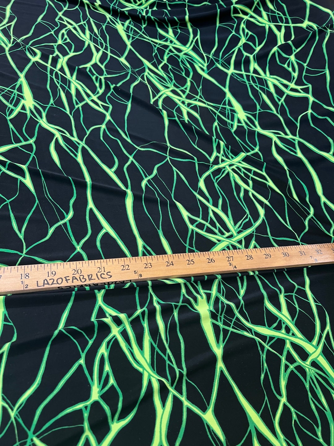 Black and Green Lighting Prim on One Way Stretch Poly Veneccia Fabric ...