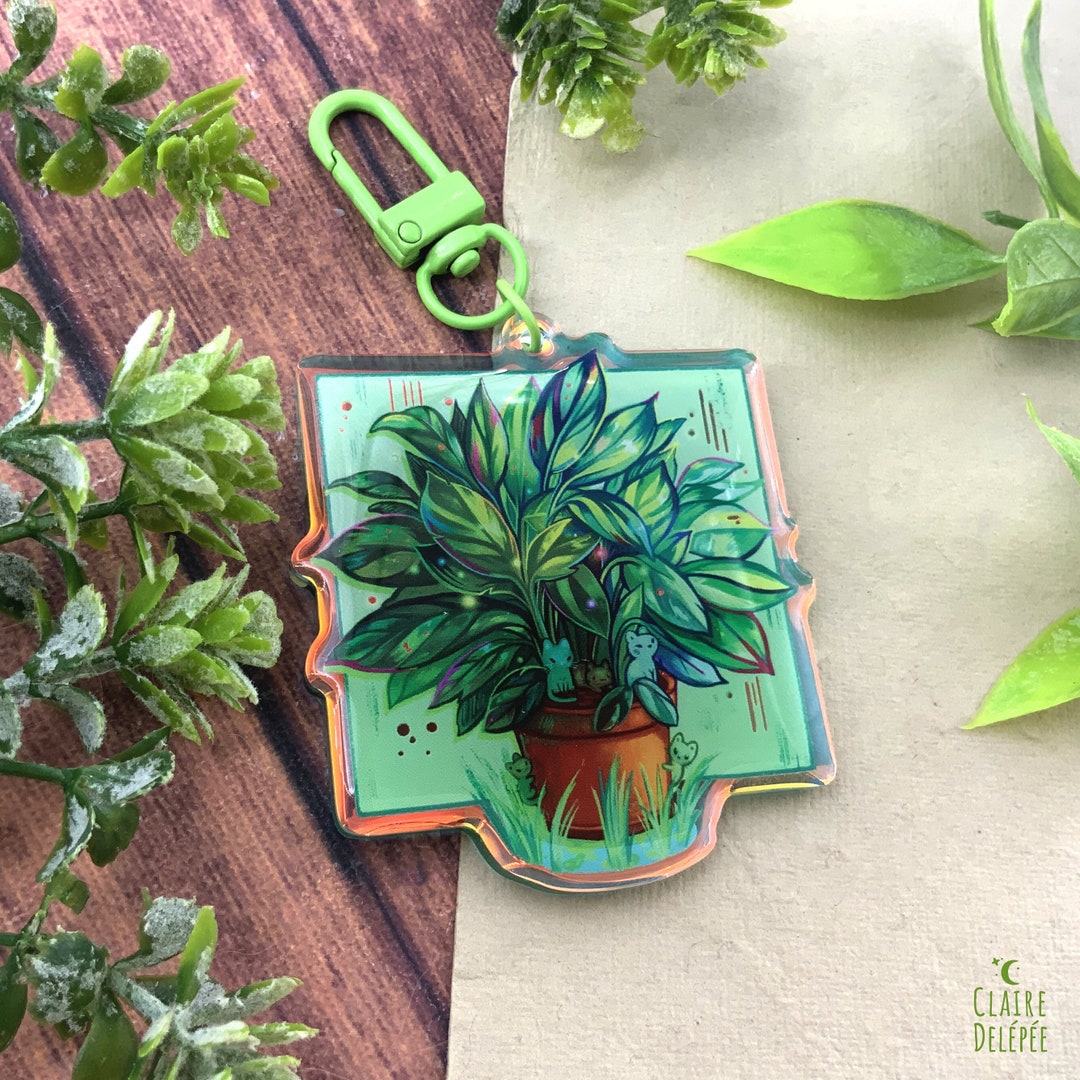 Cute Keychain Featuring a Pot of Plants and Five Very Small Cats ...