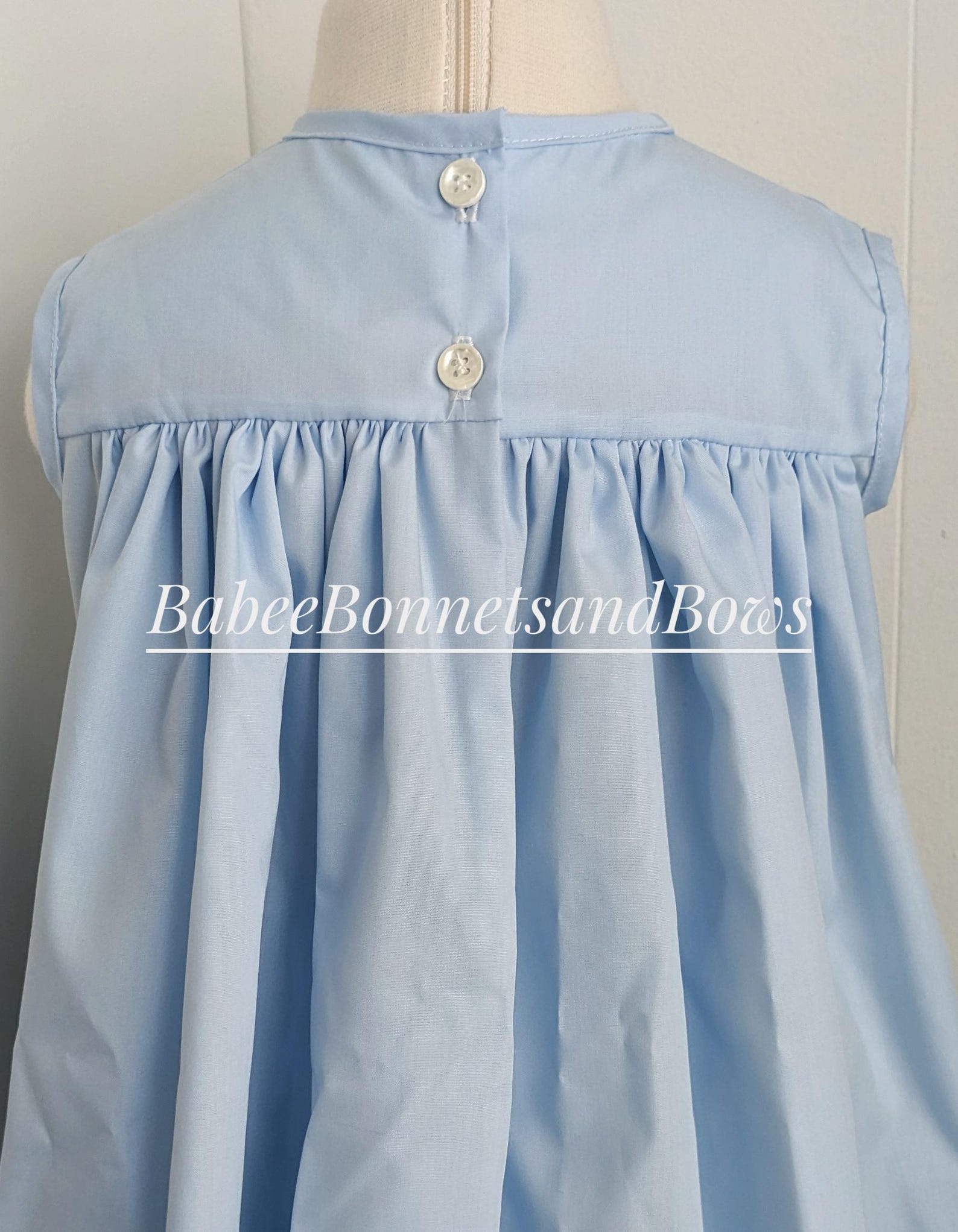 Pale Blue Smocked Dress With Bloomers. Geometric Smocking Features Pink ...
