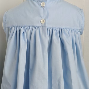 Pale Blue Smocked Dress With Bloomers. Geometric Smocking Features Pink ...