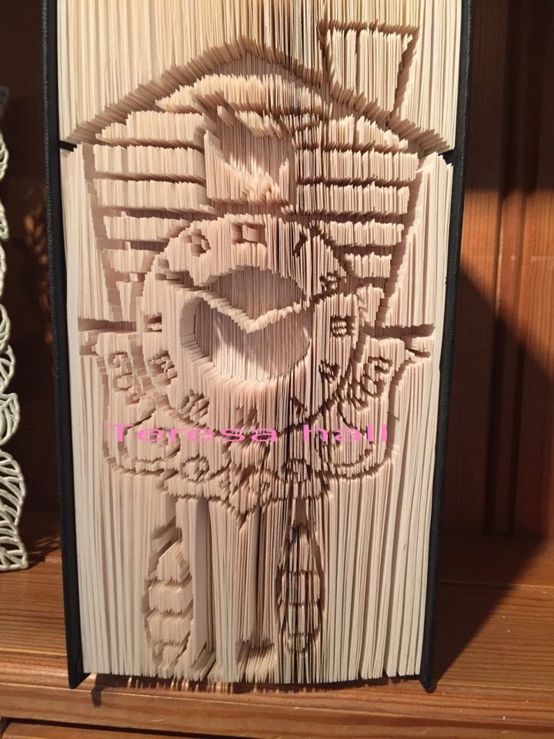 Book folding cuckoo clock cut and fold bird | Etsy