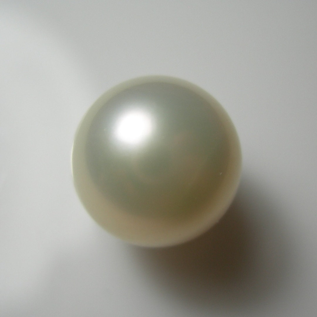 INCREÍBLEMENTE RARA Perla natural de agua dulce del río - Etsy España