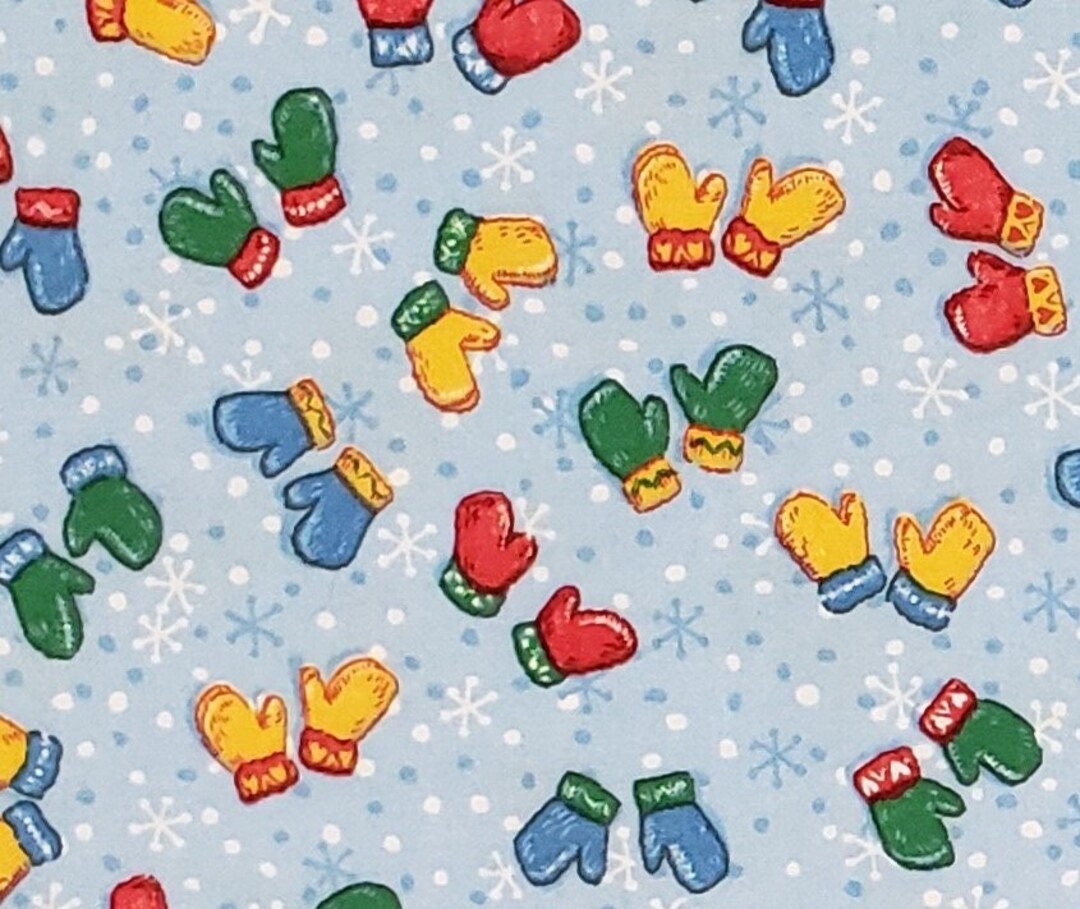 Joann Fabric - Light Blue Snowflake Fabric With Red, Yellow, Blue and ...