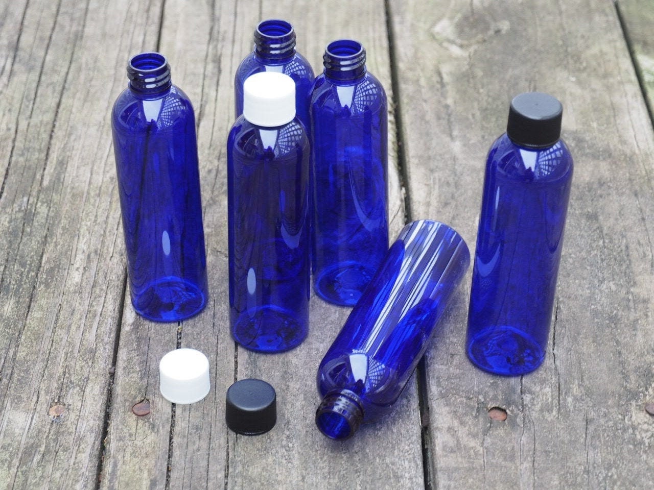Botellas de PET azul de plástico vacías de 4 oz con tapas acanaladas ...