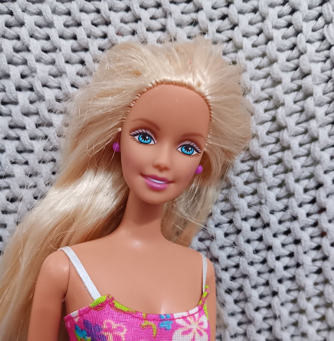Hawaii Barbie in Her Original Stock Hot Pink Floral Swimsuit C. 1999 ...
