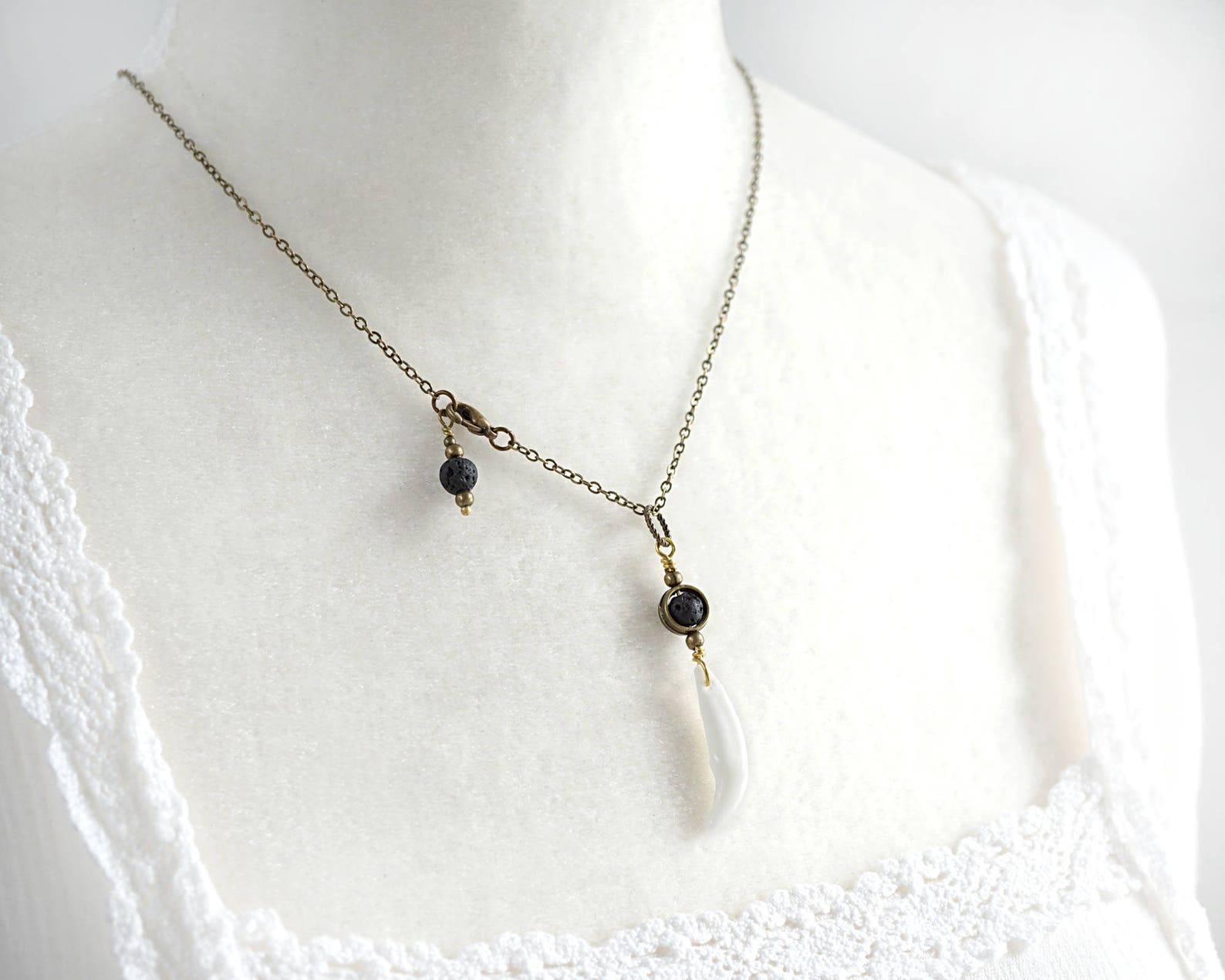 ON VACATION, Dainty Wolf Tooth Necklace Wolf Necklace Black Lava Raw ...