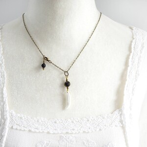 ON VACATION, Dainty Wolf Tooth Necklace Wolf Necklace Black Lava Raw ...